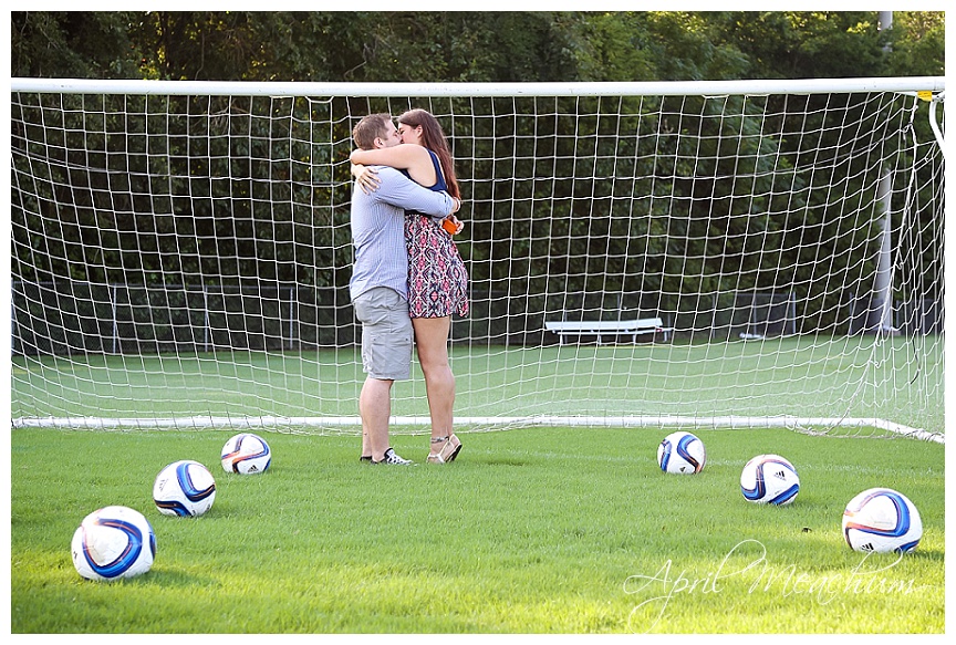 Soccer Field Engagement Proposal: Josh + Becca - April Meachum Photography